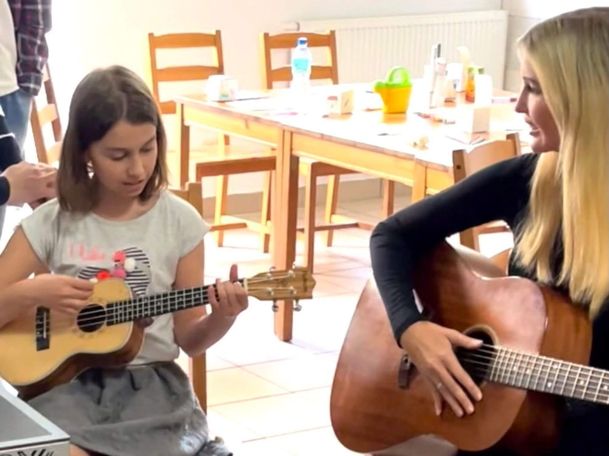 Ivanka Trump shares a musical moment on guitar with a Ukrainian refugee ...